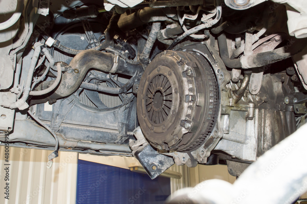 Bottom view of the engine compartment of a car with the gearbox removed ...