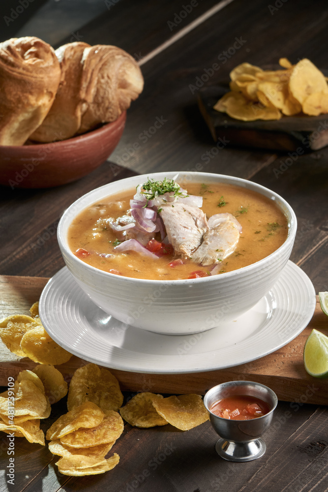 Encebollado, fish stew, served with banana and lemon fries. A typical ...