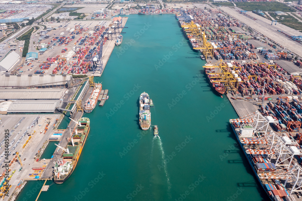 Container truck in ship port for business Logistics and transportation ...