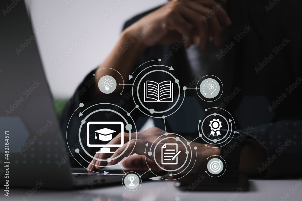 E-learning concept: A person is using a laptop computer to learn. Stock ...