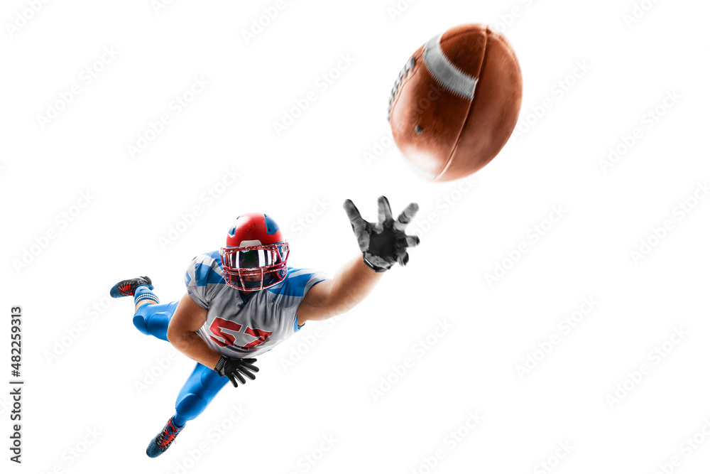 Foto American football player catches the ball and flies in the air ...