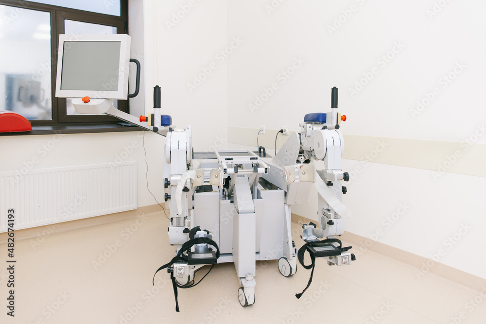 Patient on Continuous Passive Range of Motion machines. Device to ...