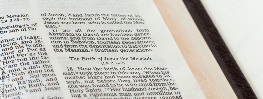 Jesus Christ's birth passage in open Holy Bible Book. A closeup. The ...