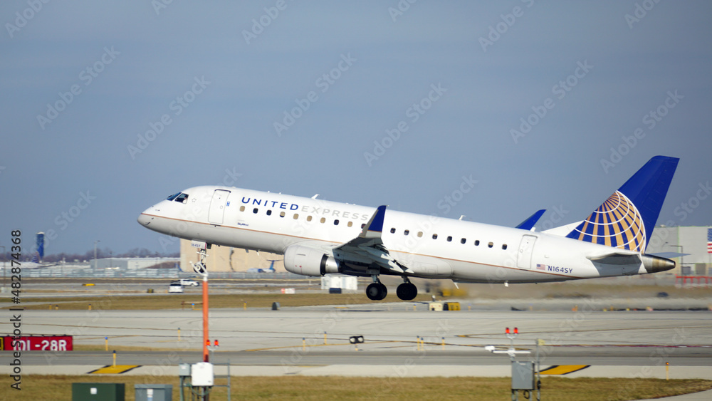 United Airlines Express Embraer E175 regional jet takes off from ...