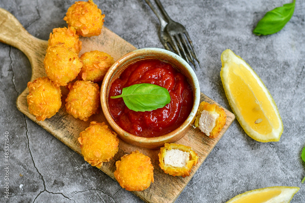 Crispy deep fried chicken popcorn nuggets . Breaded with Cornflakes ...