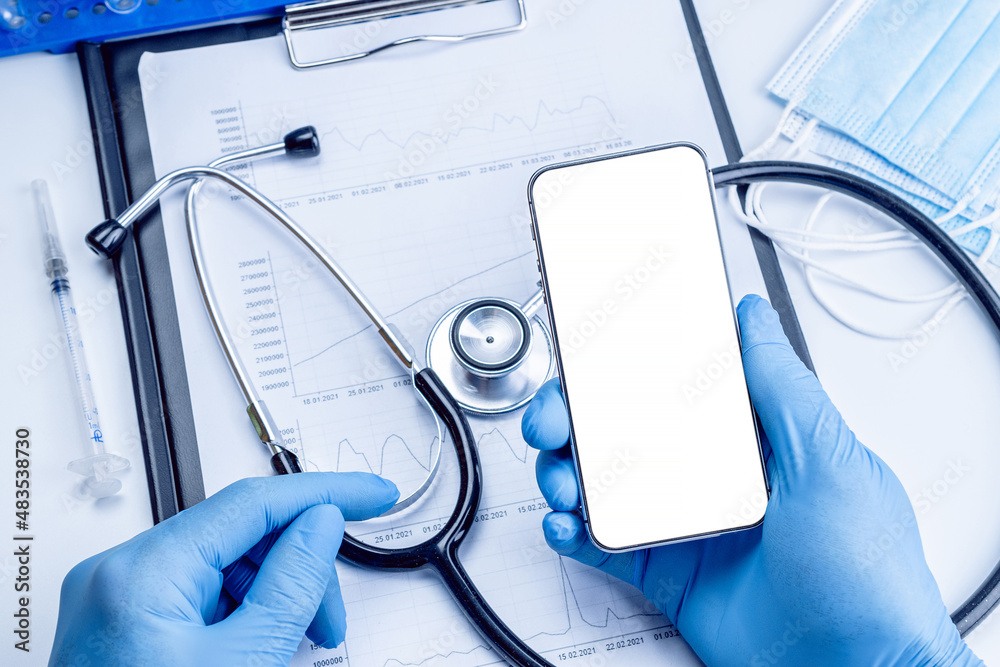 Cellphone mockup. Syringe with needle, hospital healthcare charts ...