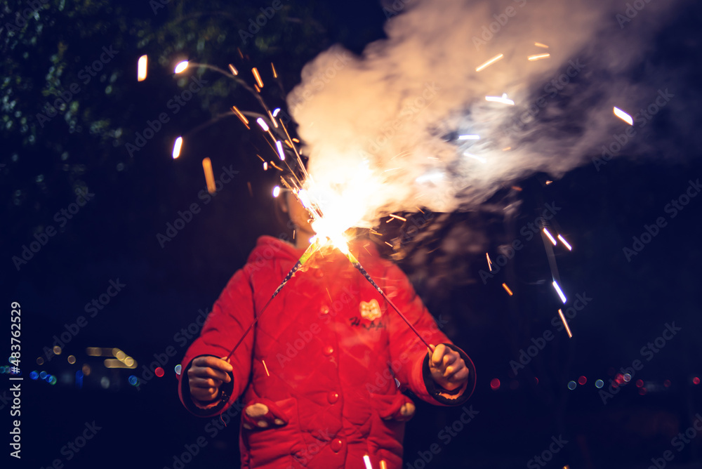 Stock-Foto „Children set off fireworks during Chinese New Year“ | Adobe ...