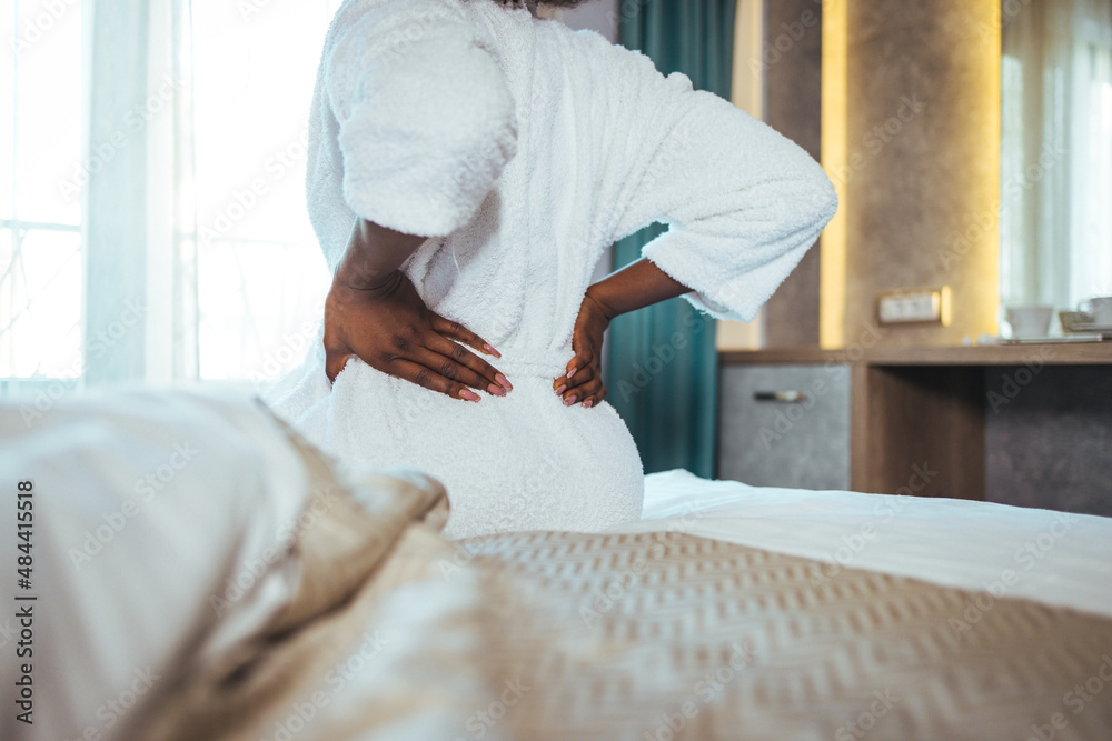 Cropped Image of Woman Suffering From Backache in Morning Sitting on ...