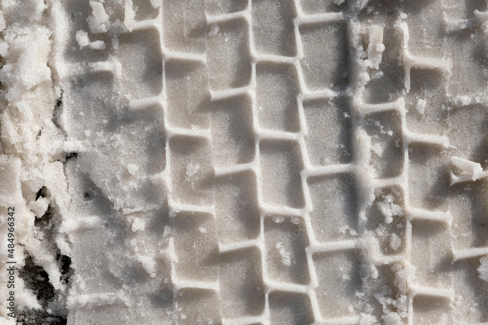 Texture of a car wheel on wet snow. Wet snow on the road top view. Road ...