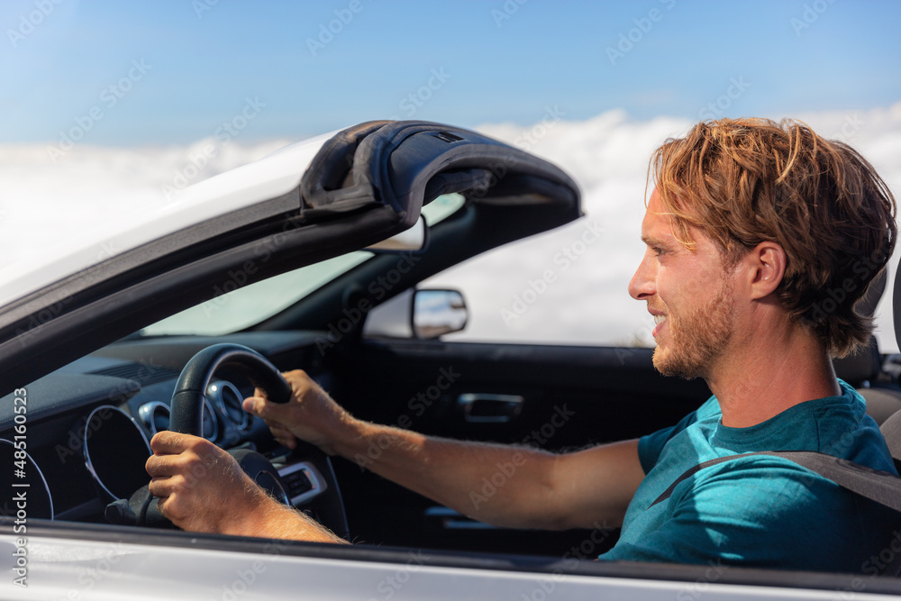 Road trip drive young man driver driving open roof convertible sports ...