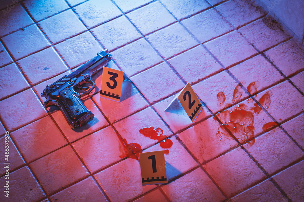 Crime scene with a gun, blood stains, hand print and yellow evidence ...