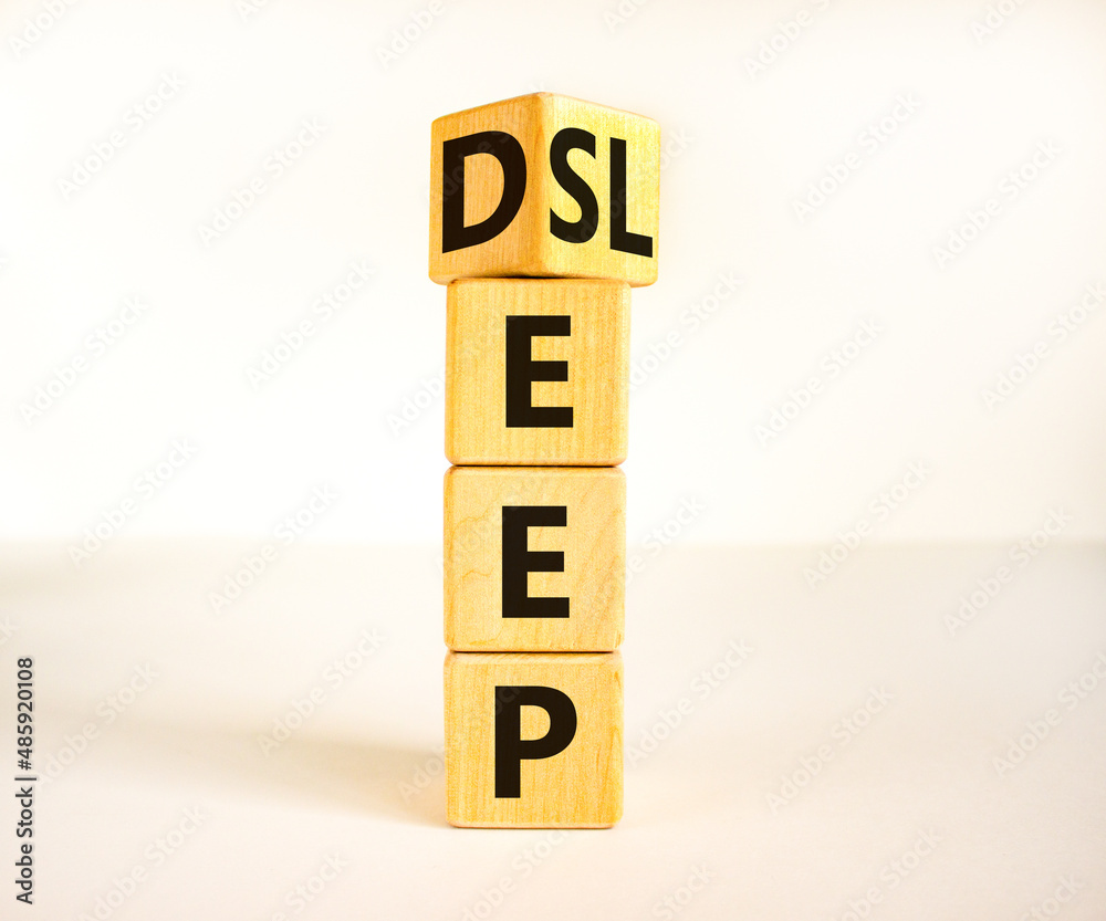 Sleep deep symbol. Turned a wooden cube with words Sleep deep ...