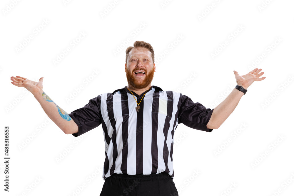 Portrait of happy, excited soccer or football referee wearing field ...