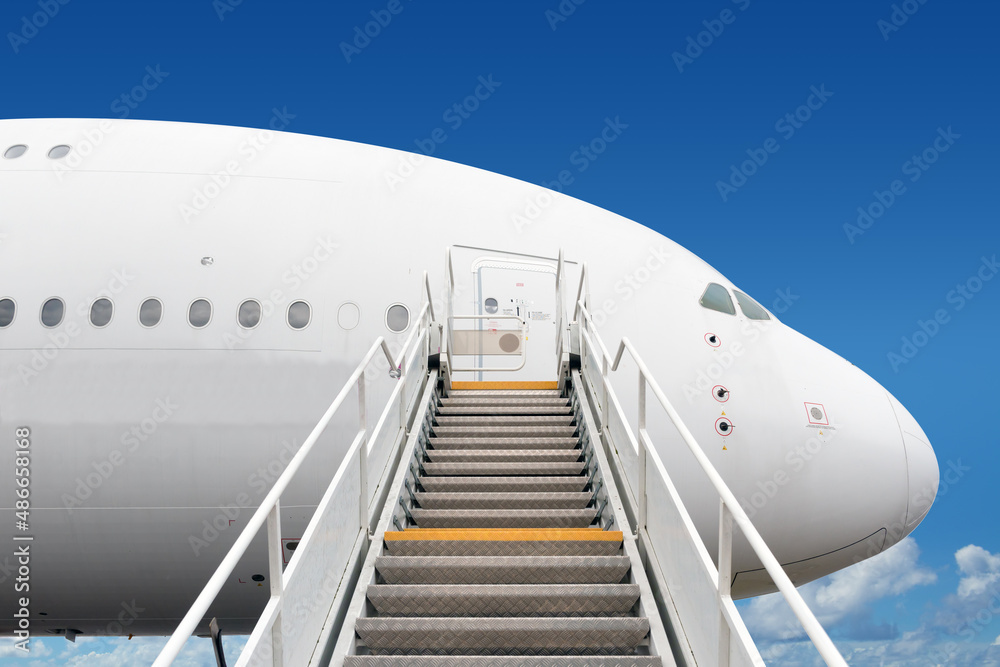 passenger boarding stairs leading to big jet plane entrance Stock Photo ...