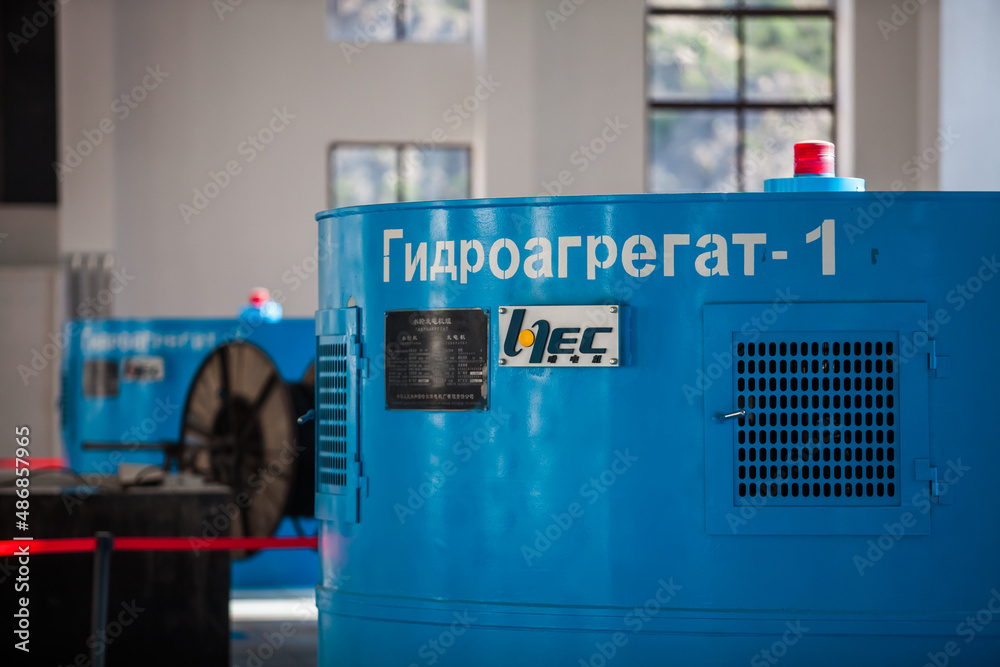 Moinak hydroelectric power station, close up view on electric generator ...