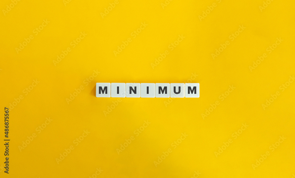 Minimum Word on Letter tiles on bright orange background. Minimal ...