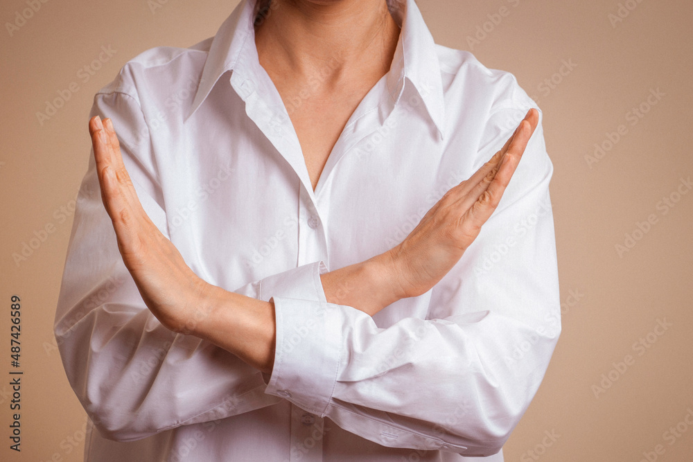 Fotografie Crossed hands. Break the bias symbol of woman's ...