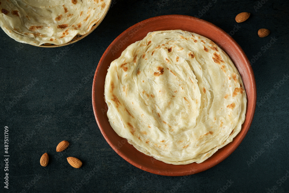 Kerala paratha porotta meat beef curry roti Malabar parotta barotta is ...