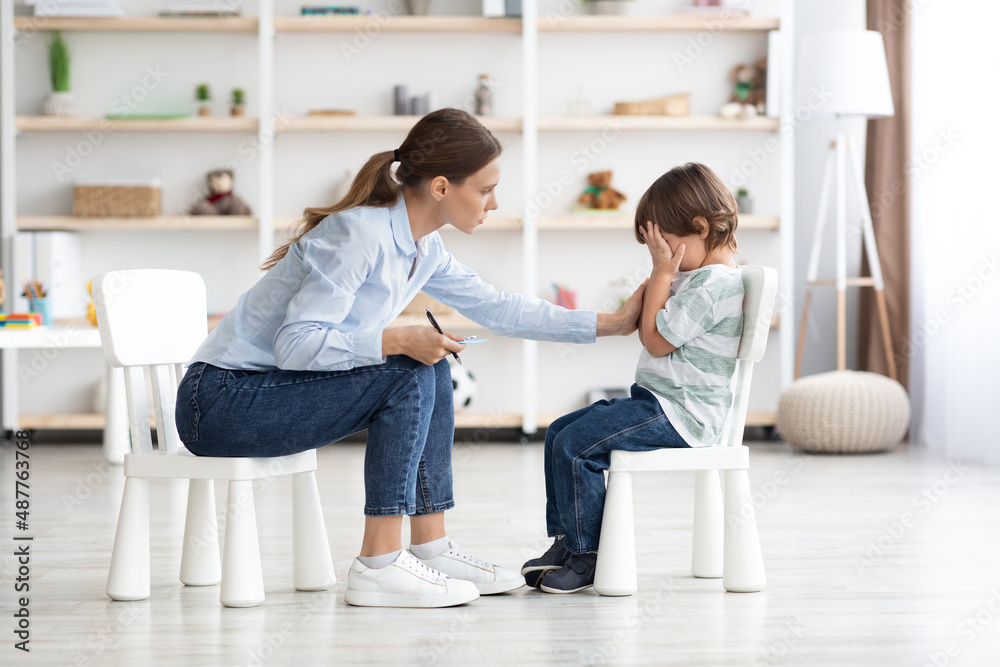 Upset little boy crying in psychologist's office unable to control ...