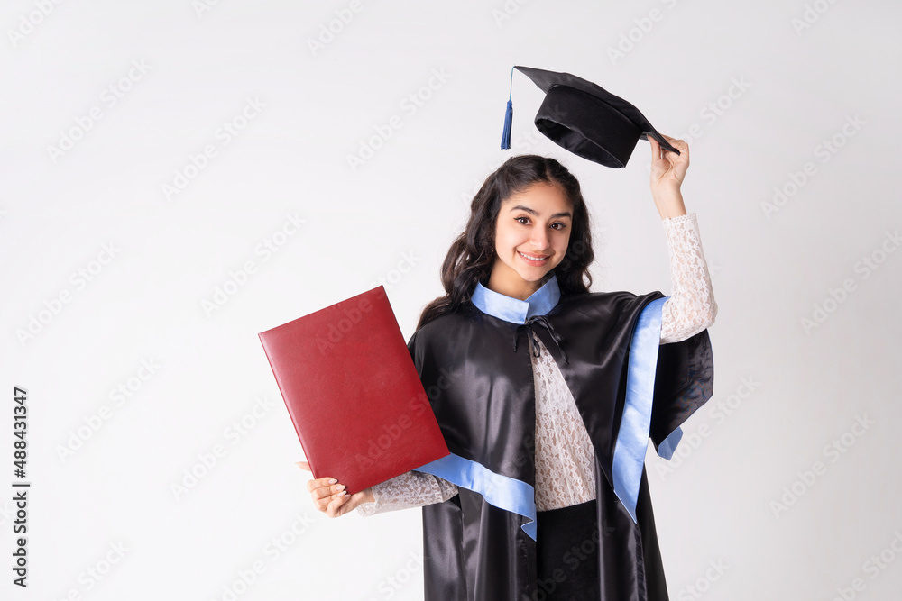 Beautiful woman university graduate wearing academic regalia with red ...