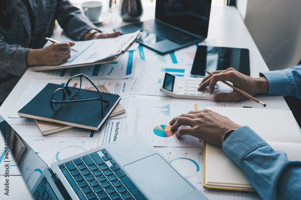 Image of Audit team working together and looking about transaction for ...