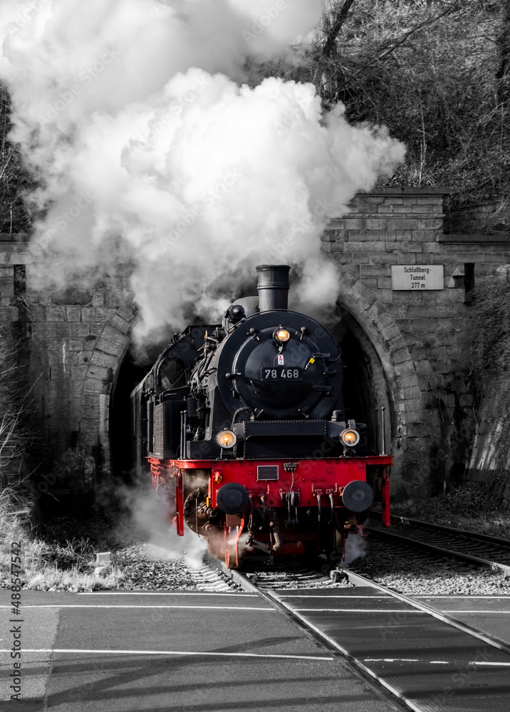 Foto de Stock Steam train with historic locomotive and coming to light ...