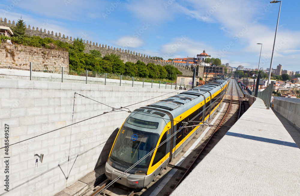 Light rail train of Metro do Porto, part of the public transport system ...