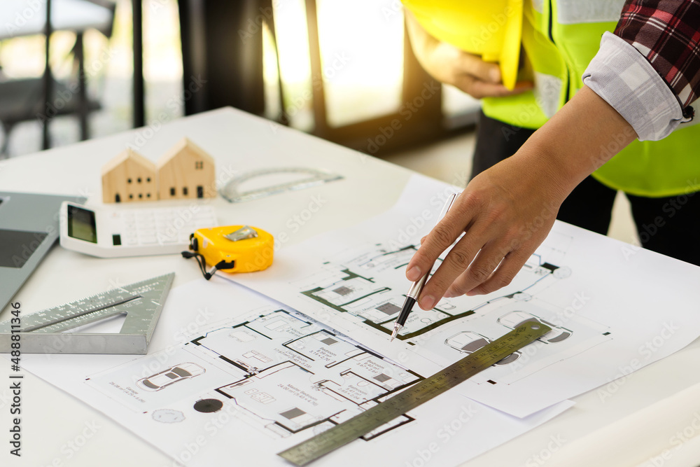 Engineers are designing houses for architectural projects. engineering ...