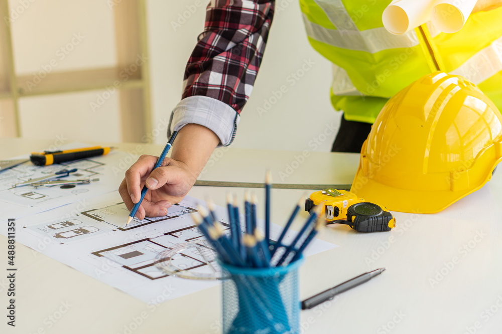 Engineers are designing houses for architectural projects. engineering ...