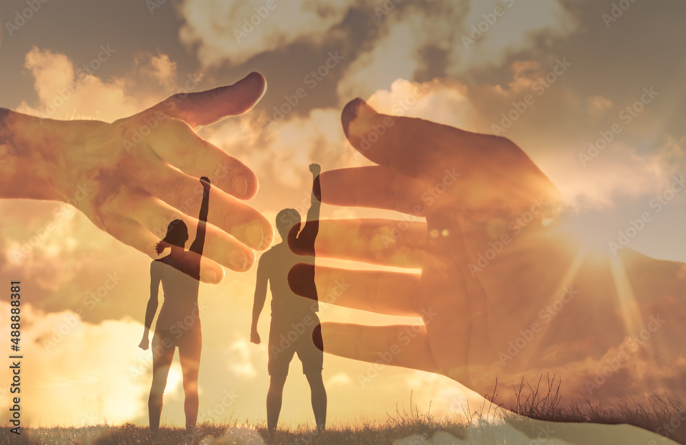 Man and woman helping each other working together as a team in unity ...