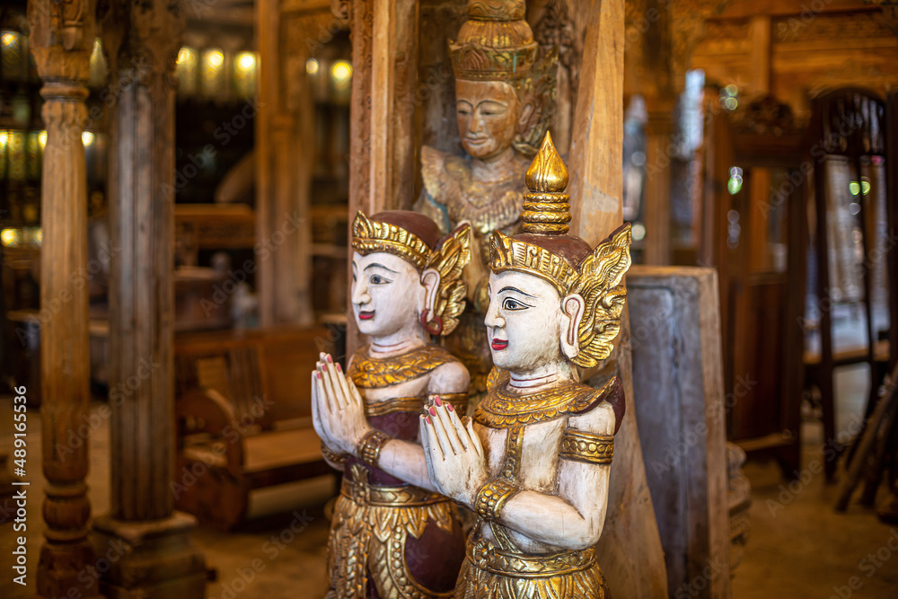 Thai Wooden doll "Sawasdee" (welcome) made from wood representing Thai ...