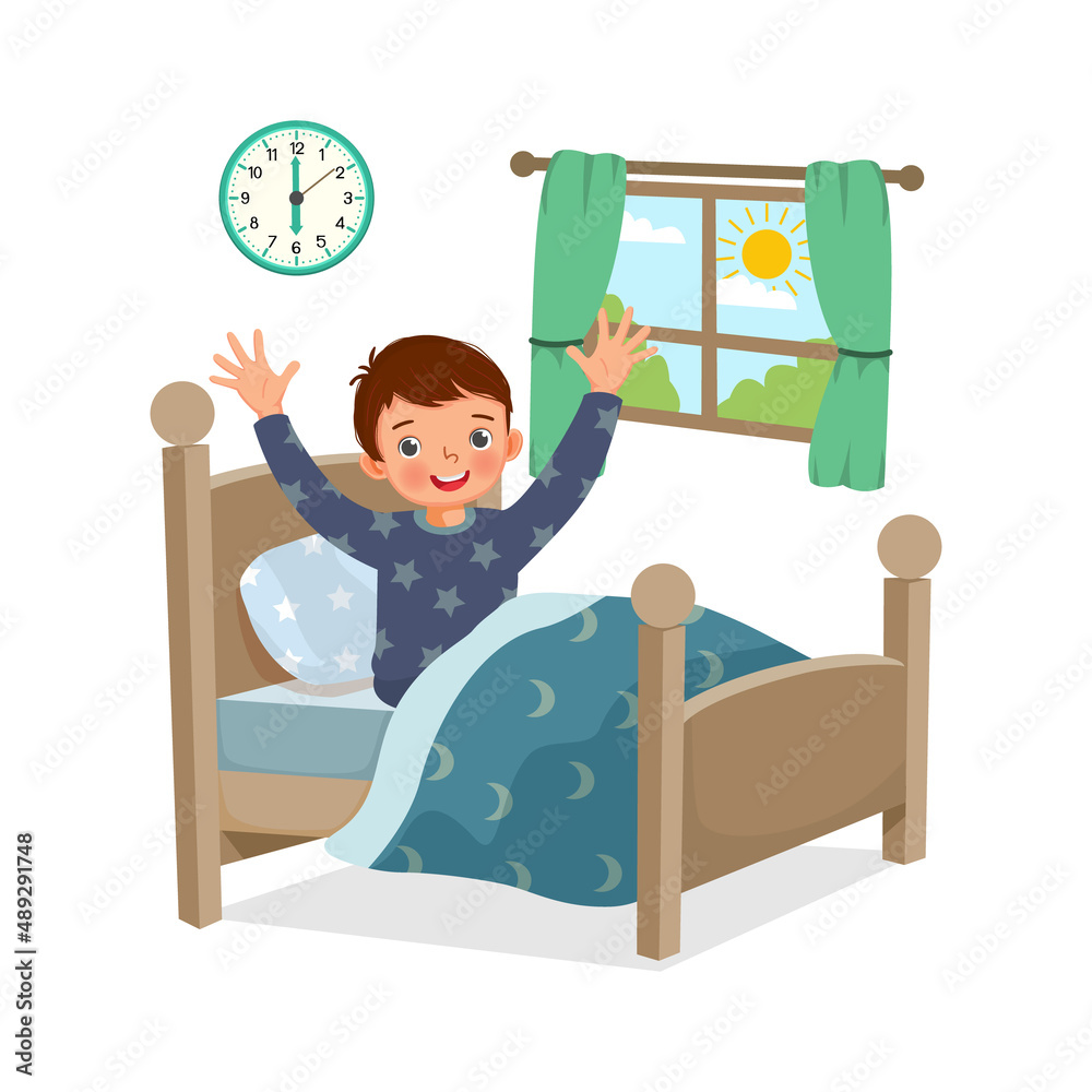 Cute little boy wakes up early in the morning stretching her body greeting good morning world ...