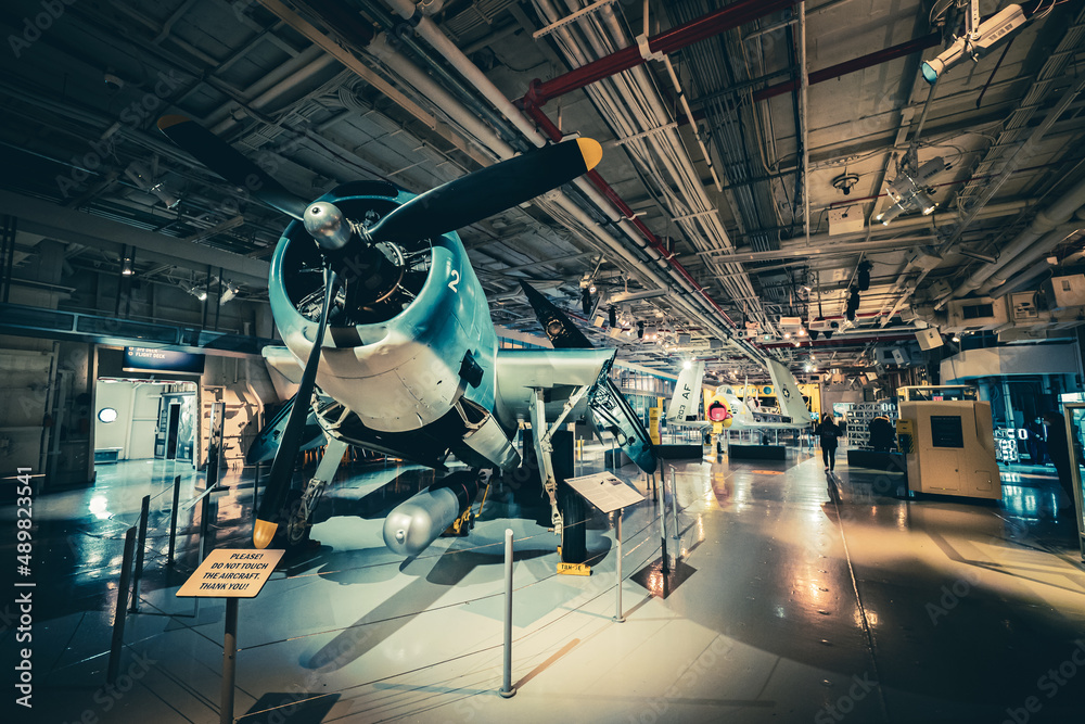 View of a Grumman TBM Avenger WWII torpedo bomber with folded wings on ...