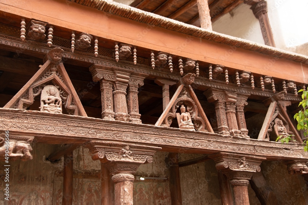 Ancient wooden carving on the entrance to Alchi monastery in Ladakh ...