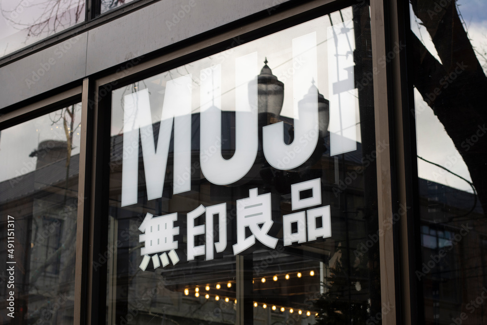 Portland, OR, USA - Dec 26, 2021: Closeup of the MUJI logo seen at the ...