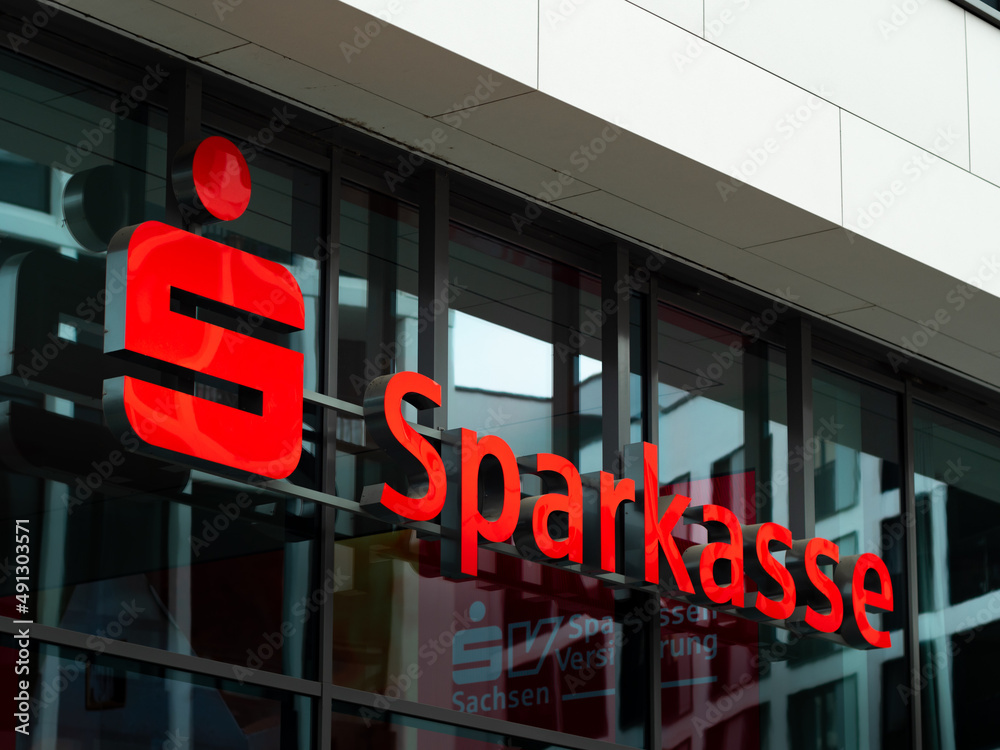 DRESDEN, GERMANY - 06. March 2022: Sparkasse bank logo on a new glass ...