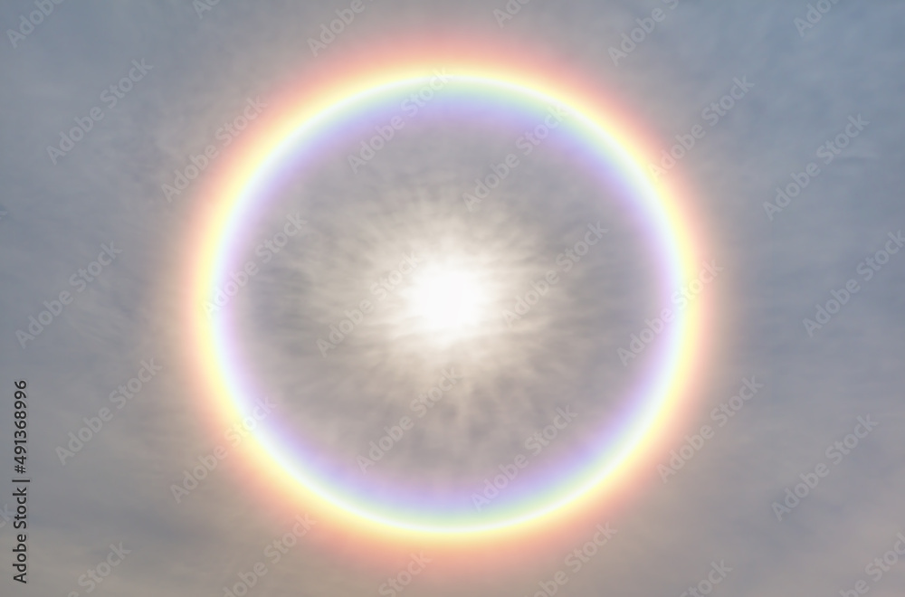 Circular rainbow cloud with amazing sunset Stock Photo | Adobe Stock