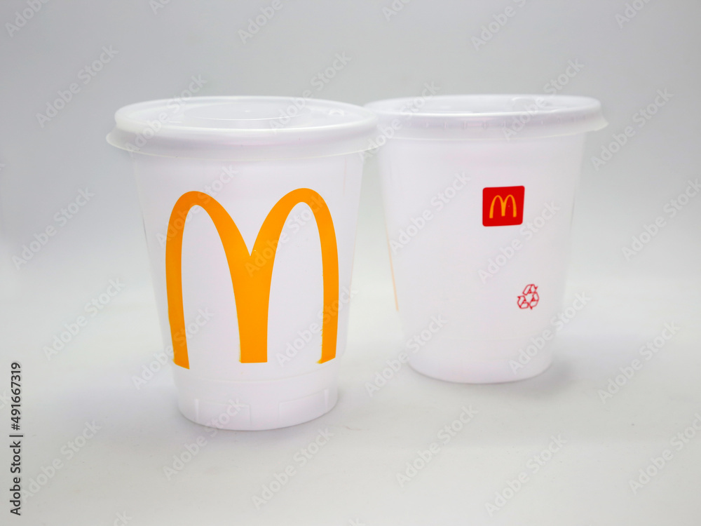 McDonald's. Logo. Isologotype. Glass with the M for McDonald's. Drink ...