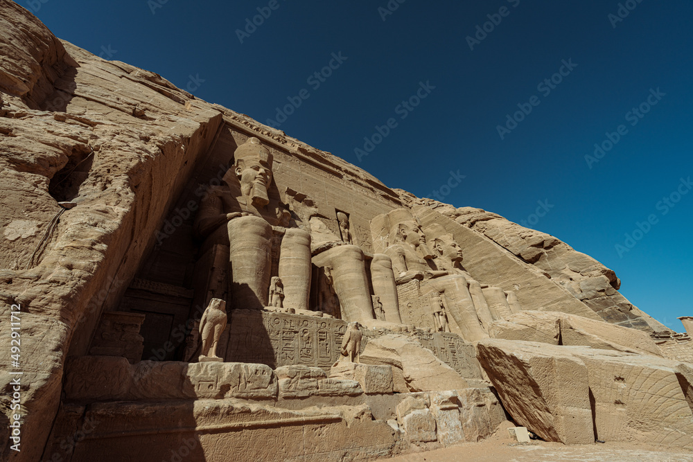Aswan landmarks. Abu Simbel temple in Aswan. Traveling girl. Ramses the ...