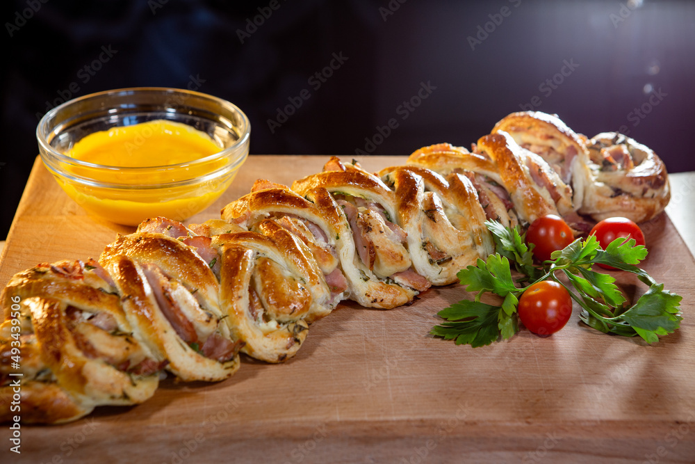 braided meat pie with puff pastry cheese Stock Photo | Adobe Stock