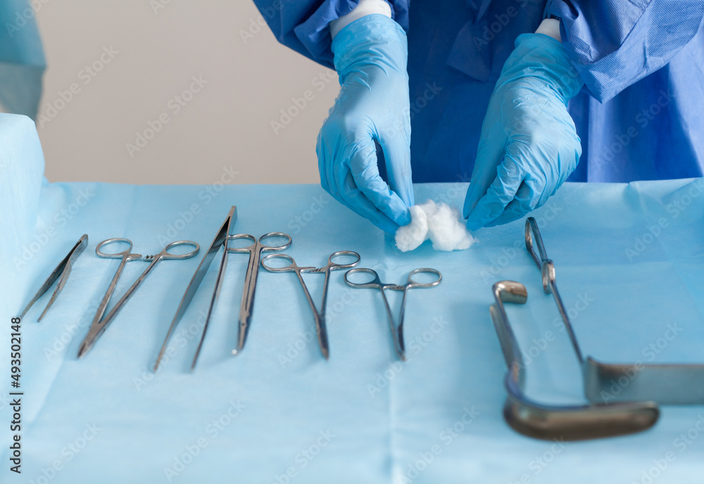 Foto de Stock Sterile curettage instruments, forceps, retractor in the ...