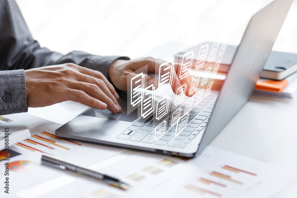 Businessman signs an electronic document on a digital document on a ...