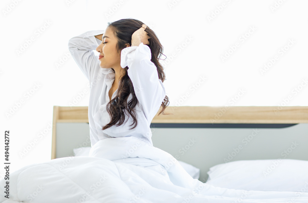 Asian young beautiful happy sexy female teenager model in casual pajama ...