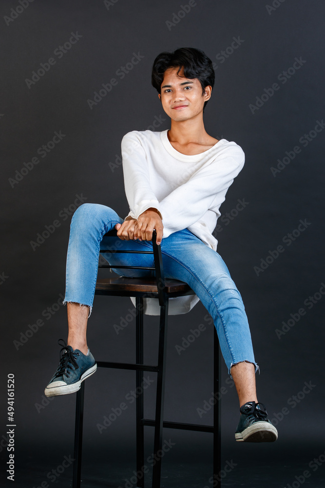 Portrait studio full body shot of Asian young LGBTQ gay glamour ...