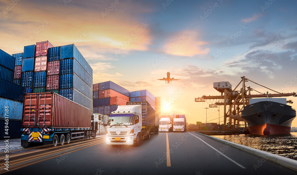 Container truck in ship port for business Logistics and transportation ...