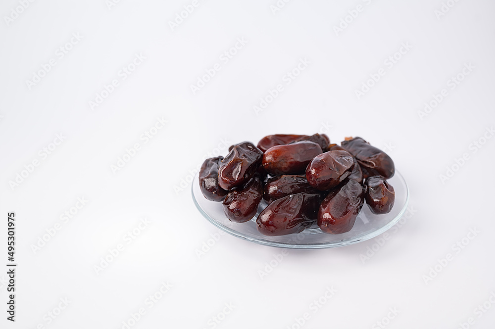 Dry pitted dates fruits on white background. Ramadan fasting concept ...