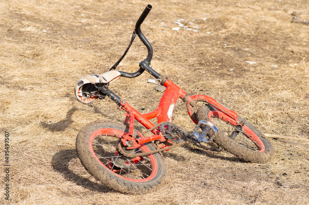 Be careful while driving by bike lying on the grass falling from a ...