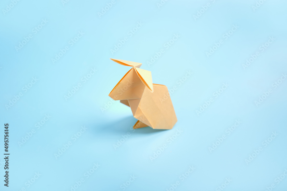 Origami Bunny. Step-by-step photo instruction on a blue background ...