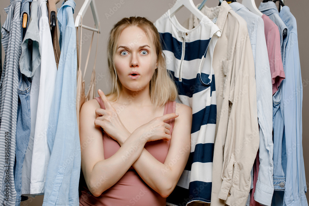 depressed woman with a surprised face and bulging eyes pointing at ...