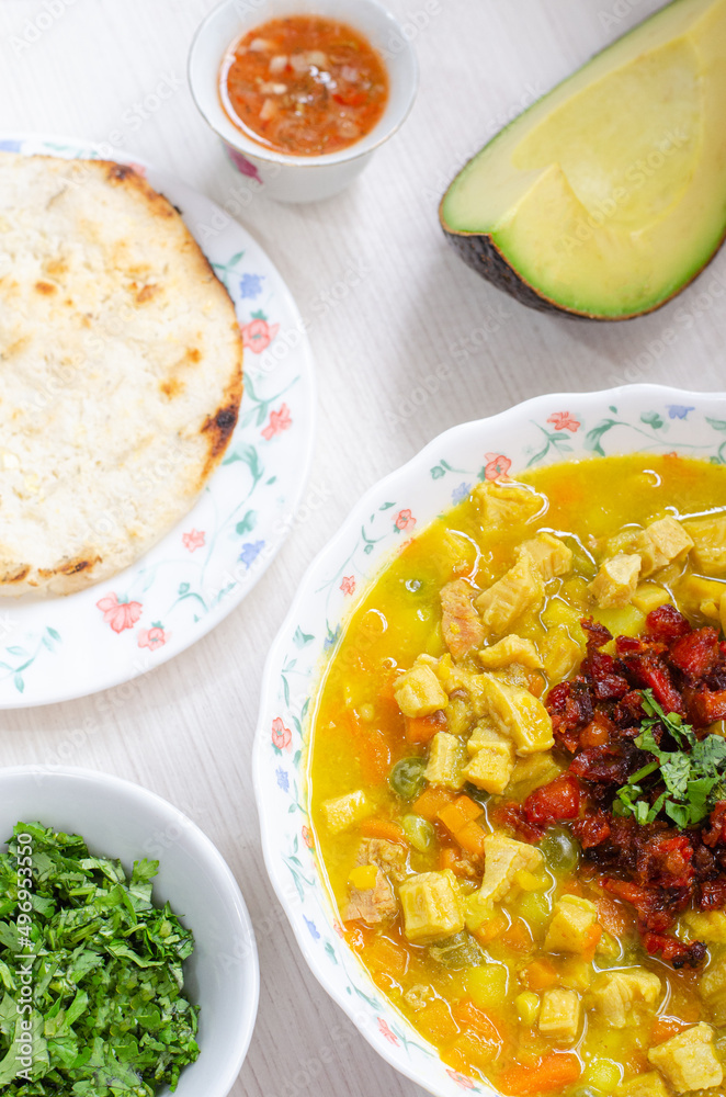 Plate with tripe soup, called mondongo, traditional food from Colombia ...